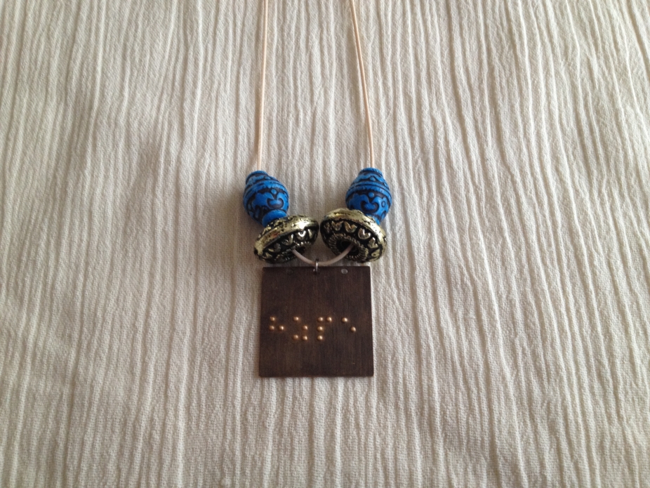 Braille word Hope tribal bead necklace in blue and gold