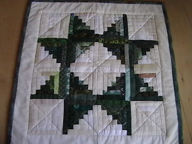 Quilted Green Log Cabin Star Table Topper by Bits N Pieces, Pillows
